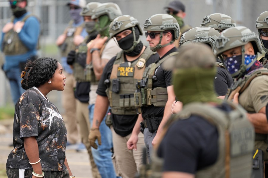 Protesters, ICE agents remain outside Delaney Hall
