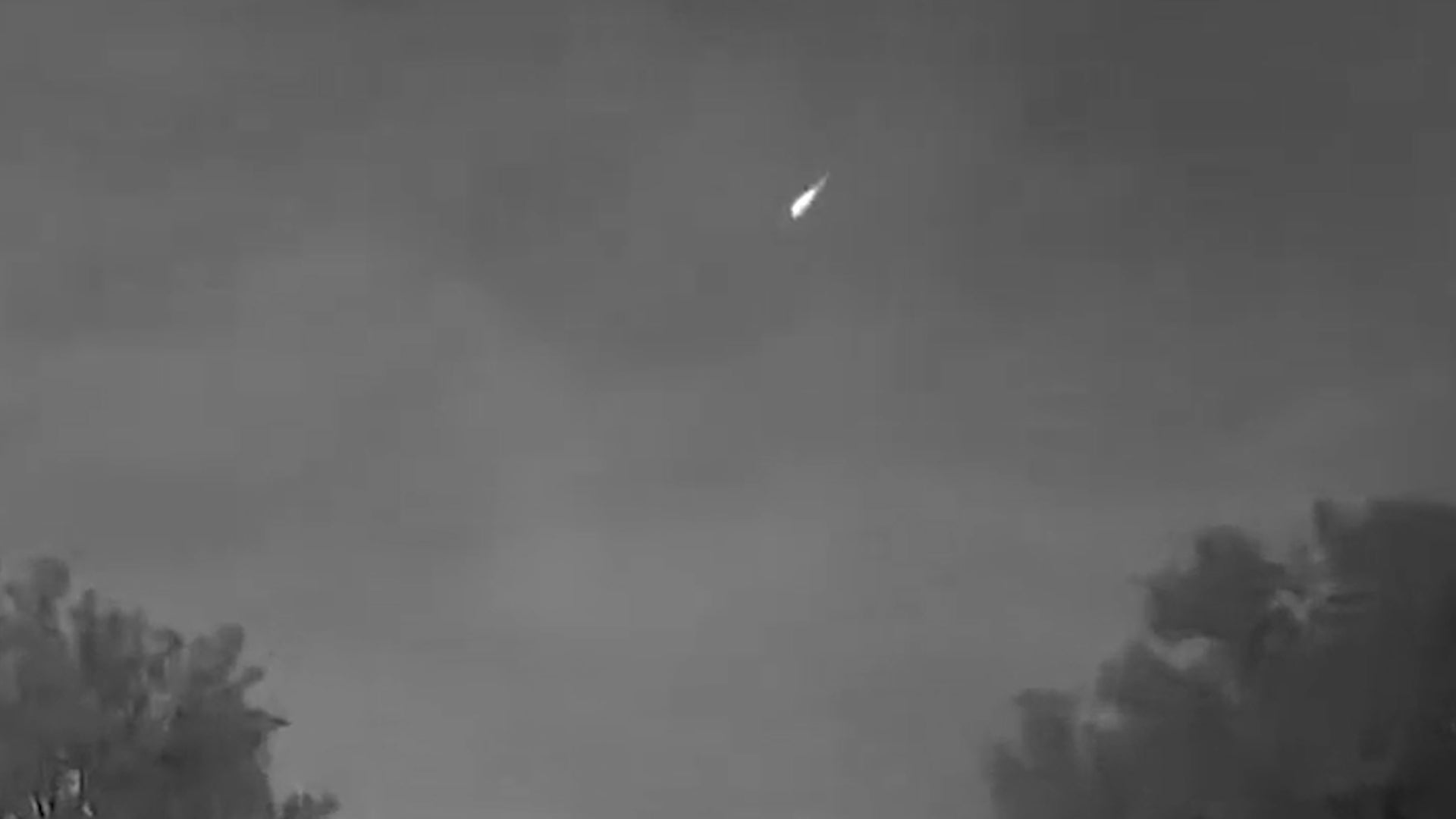 Possible meteor streaks over Buffalo sky