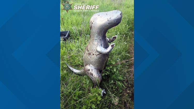 Spokane deputies recover stolen metal T-Rex statue buried underground