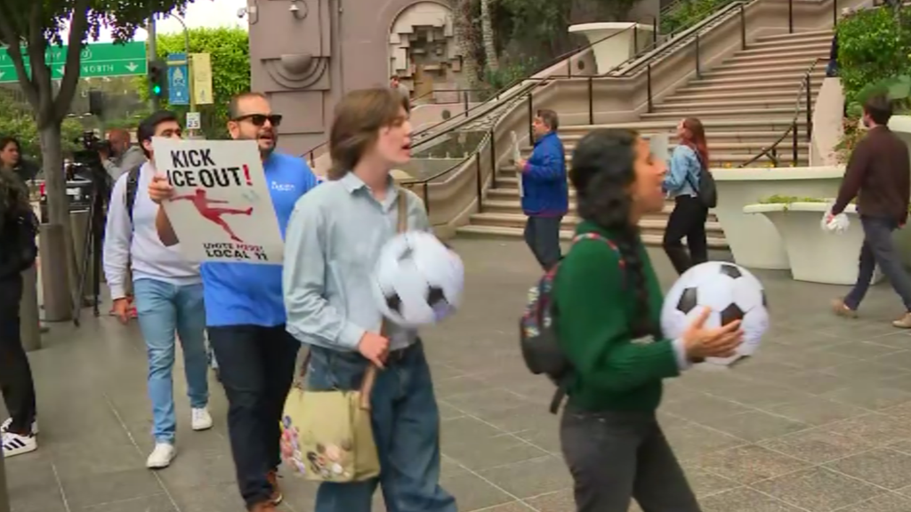 Immigrant rights advocates rally at FIFA World Cup LA offices, asking ...