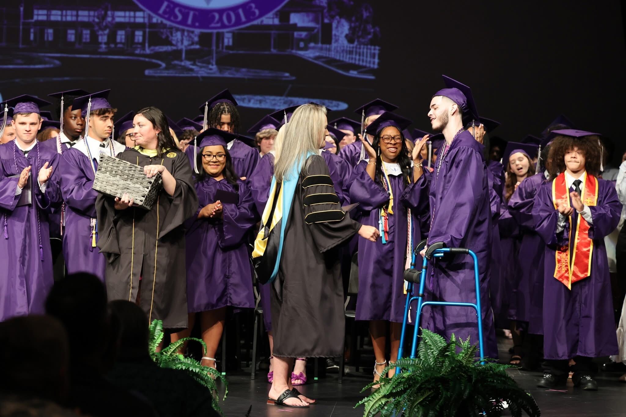 Gaston County senior defies odds, walks at graduation months after ...