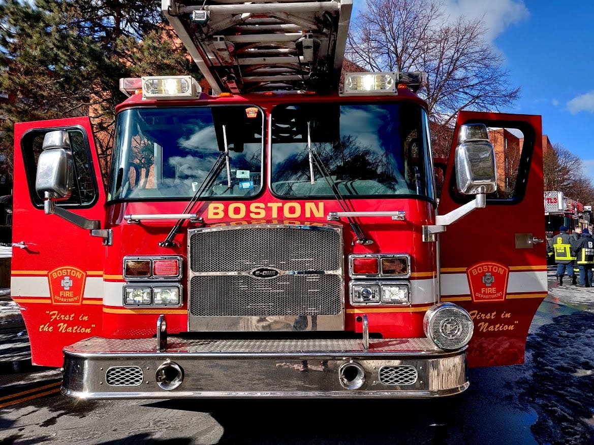 Boston Fire Department places patch on engine in honor of fallen member ...