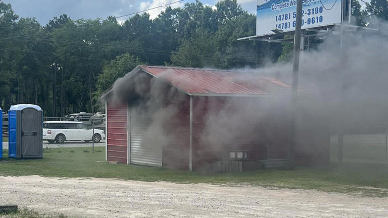 Metal storage building catches fire on Highway 15 North