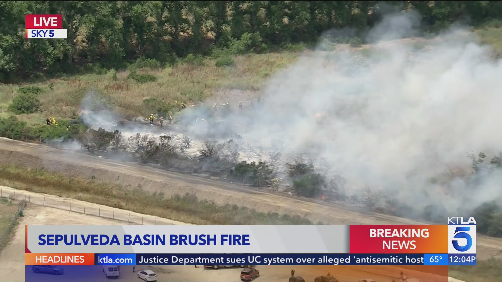 Brush fire erupts near LA golf course