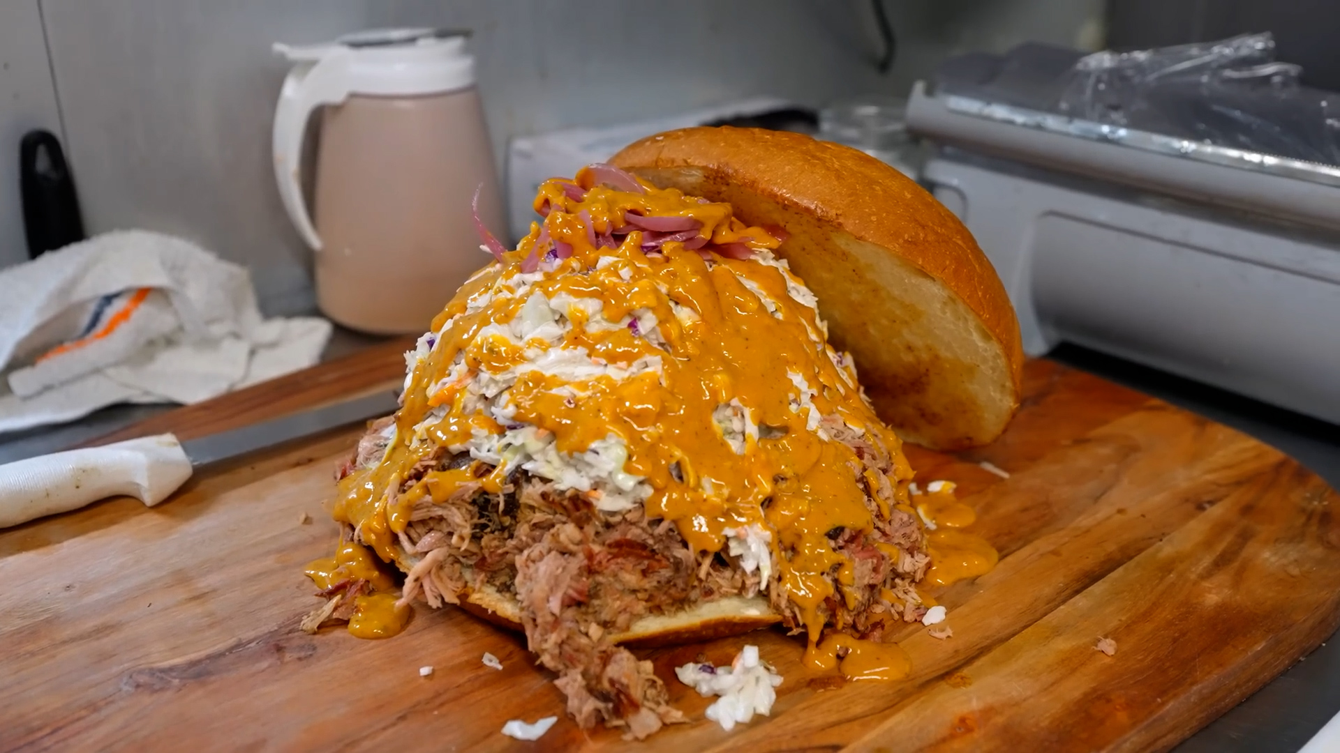 Man attempts giant Carolina pulled pork sandwich challenge with loaded ...
