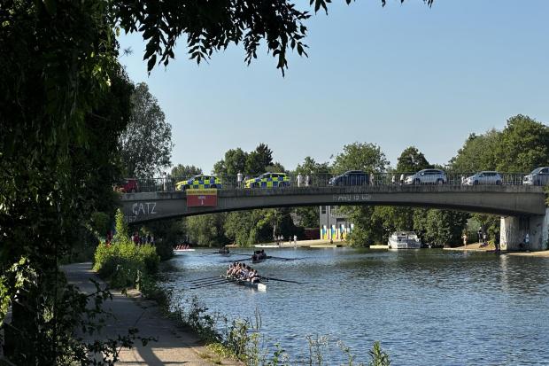 Oxford bridge closed and rowing race cancelled as emergency services ...