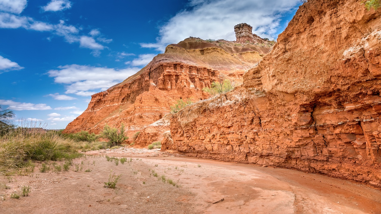 The flat plains near Amarillo suddenly crack open into 800 feet of canyon