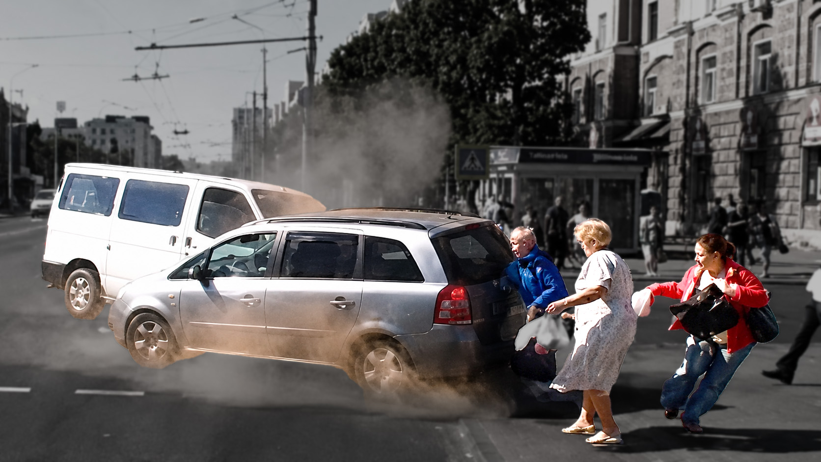 Close call as car crash almost strikes pedestrian