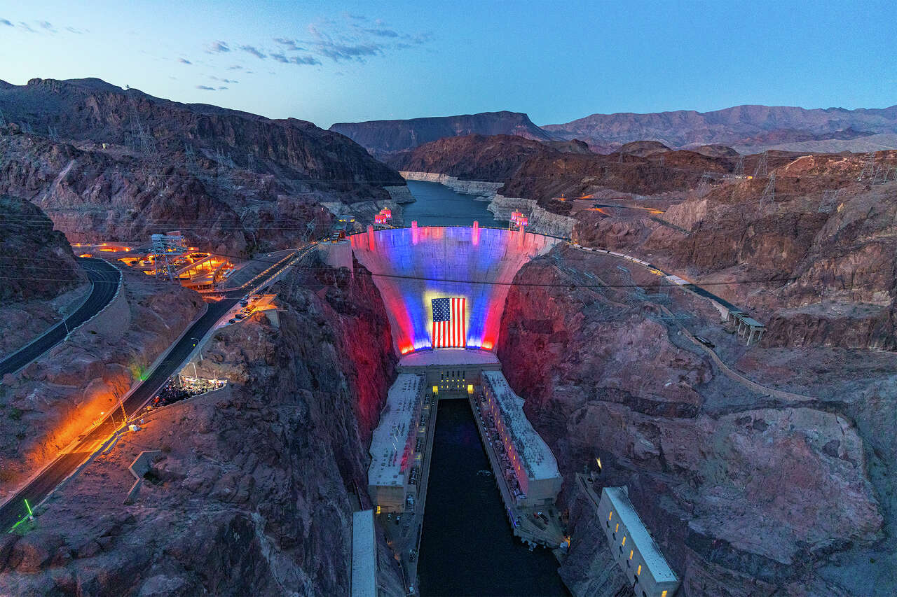 Enormous American flag draped over Hoover Dam as Lake Mead endures ...