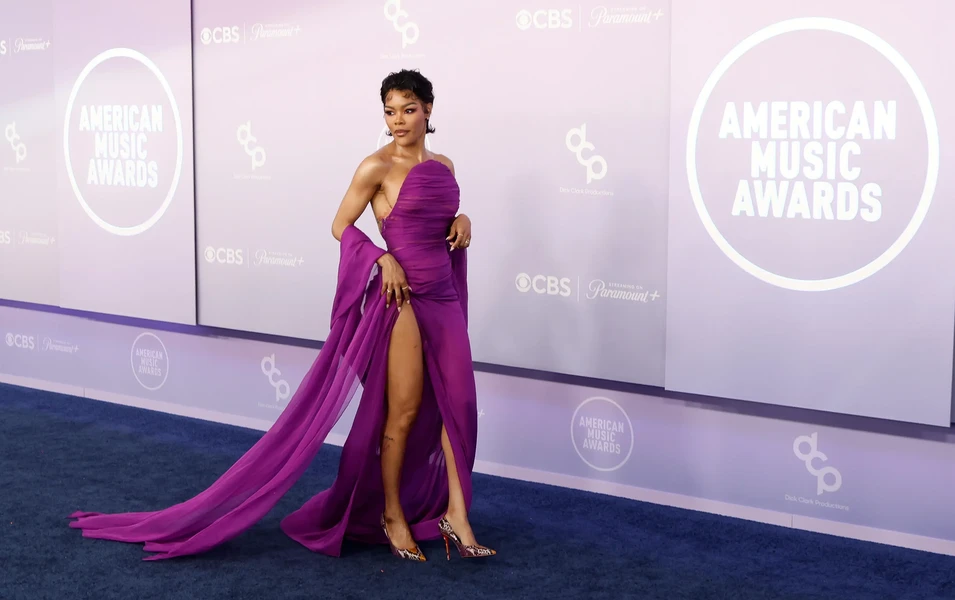 Teyana Taylor debuts edgy mullet and Balenciaga gown at AMAs