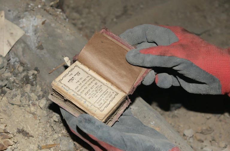 Star of David band, siddur found under attic floorboards in building ...