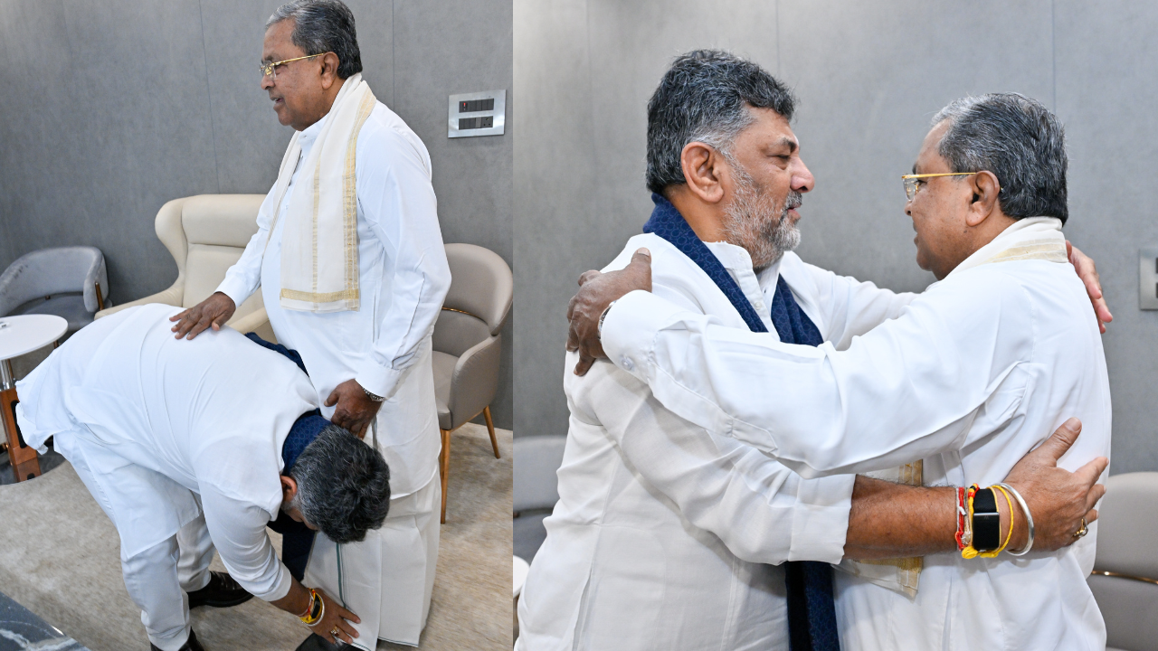 DK Shivakumar hugs Siddaramaiah, touches his feet - photos