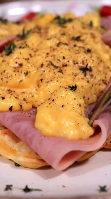 Savory thyme parmesan waffles with creamy scrambled eggs
