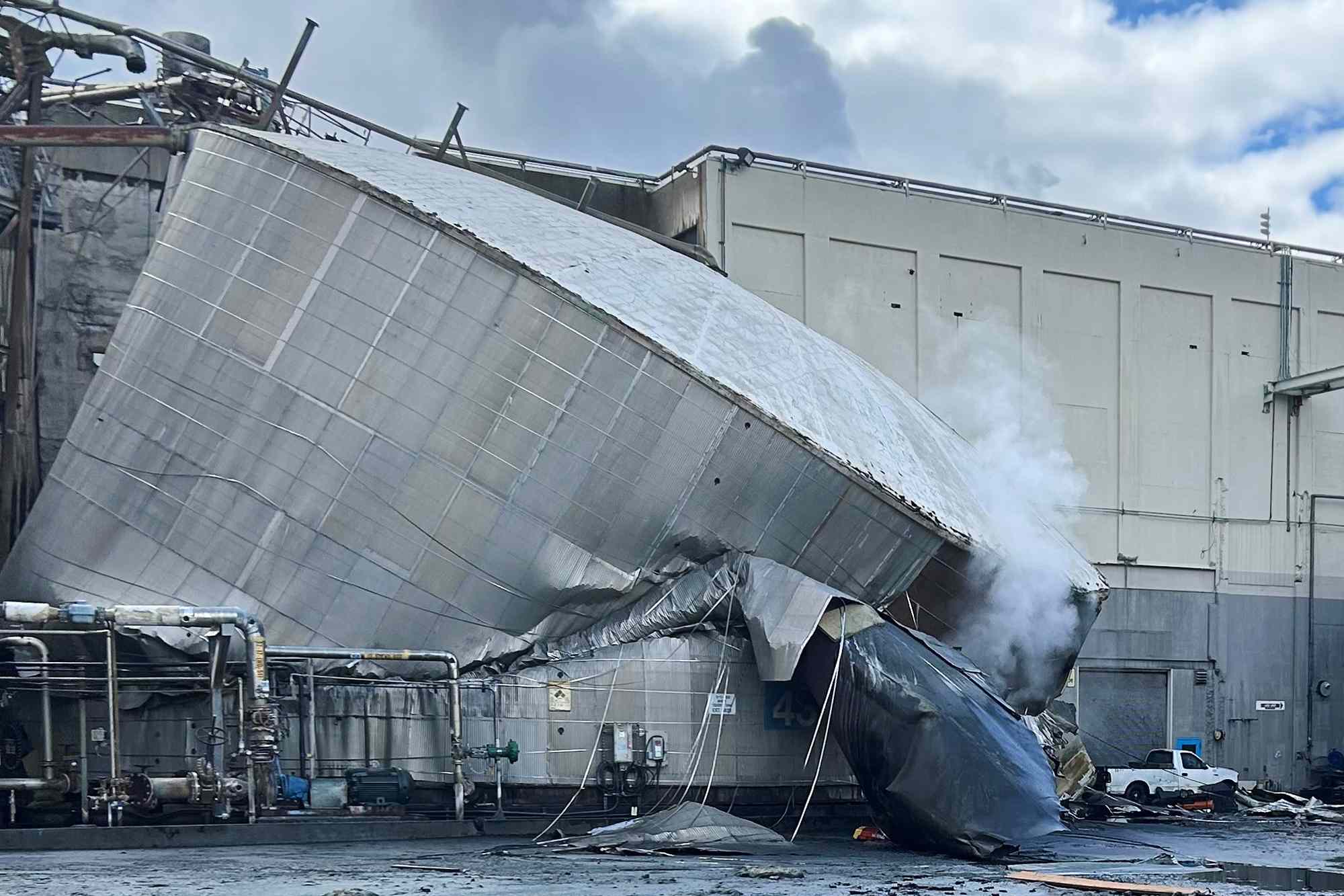 2 dead, 9 missing after chemical tank implosion at paper mill