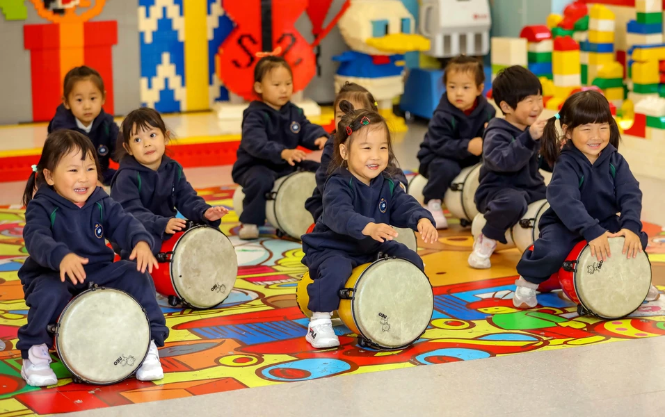 Raising brighter minds through early play and music