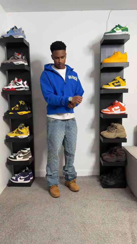 Fresh streetwear fit check by the sneaker wall