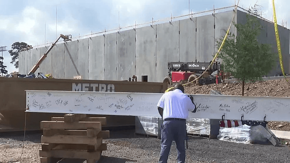 Final steel beam lifted as Joe T Robinson unveils new 3-story classroom ...