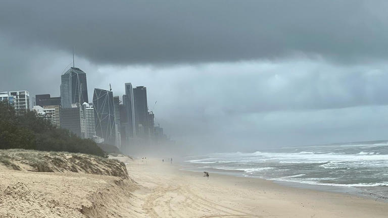 Wild scenes as cars swept away in deluge