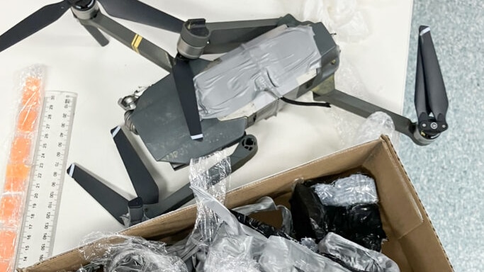 Officers down drone carrying $1 million worth of drugs, syringes into ...