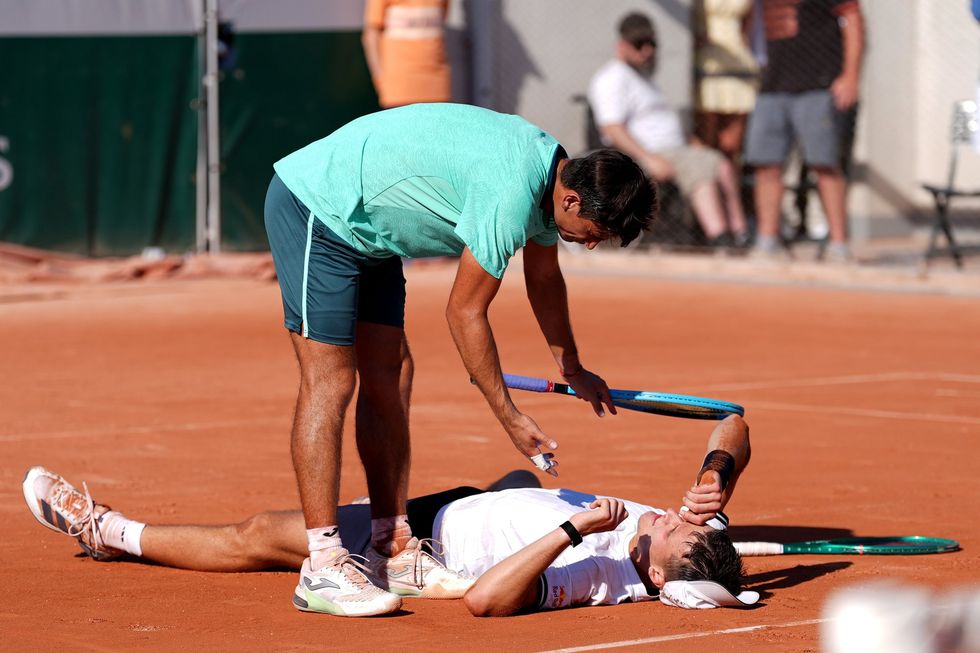 French Open star collapses and needs wheelchair to come off court