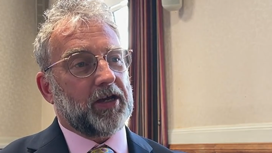 Former council leader wins second term in post