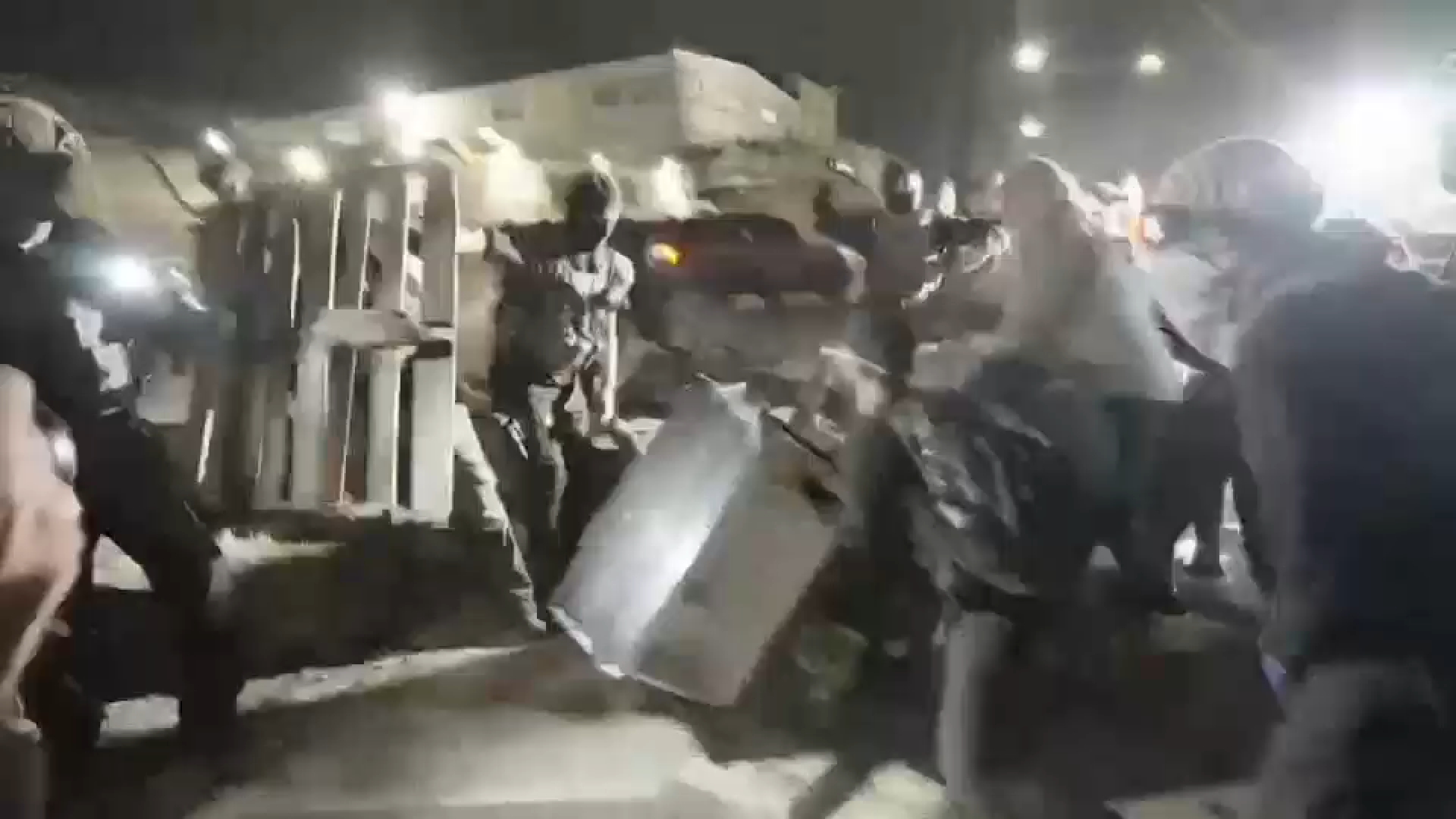 Protesters shoved, pepper sprayed during clash with ICE agents outside ...