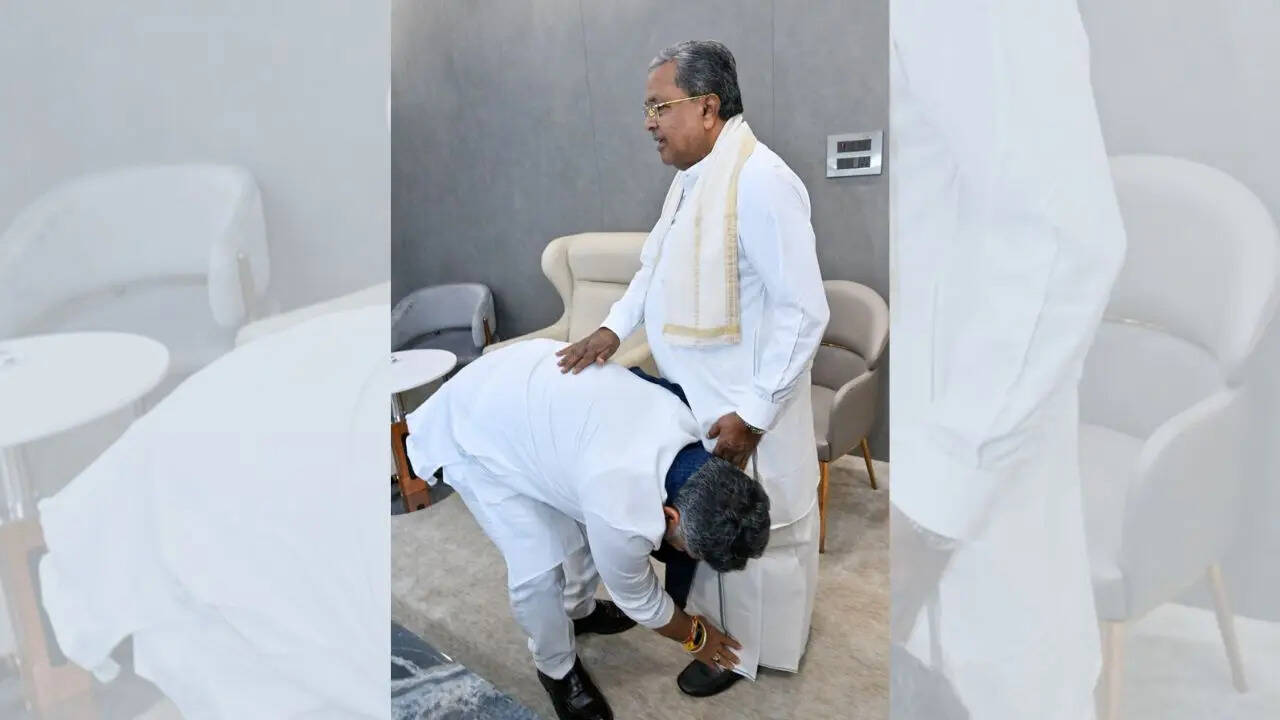 Hugs & hot idlis: Bonhomie before the big call? DK Shivakumar touches ...