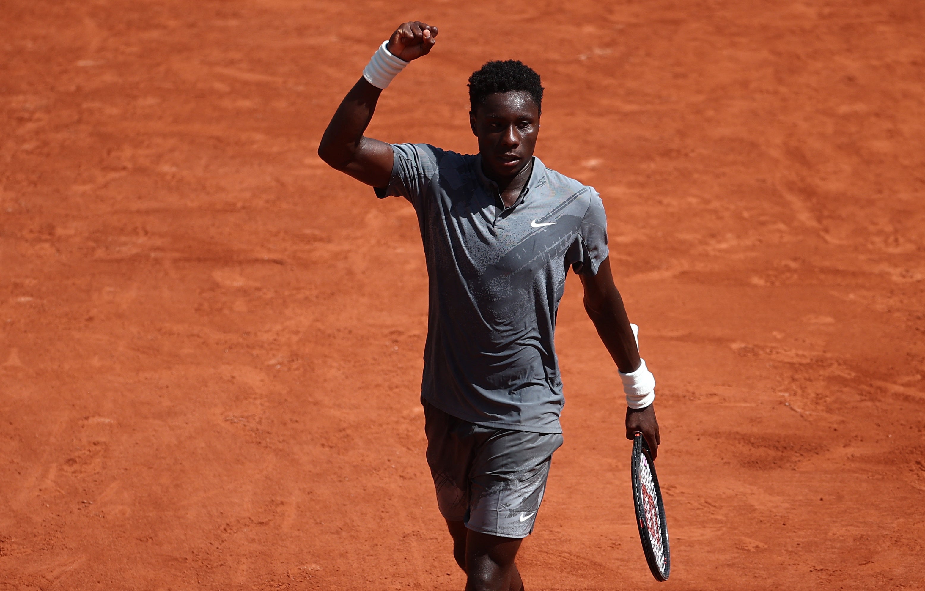 French Open favourite Sinner battles heat, Kouame bids for history