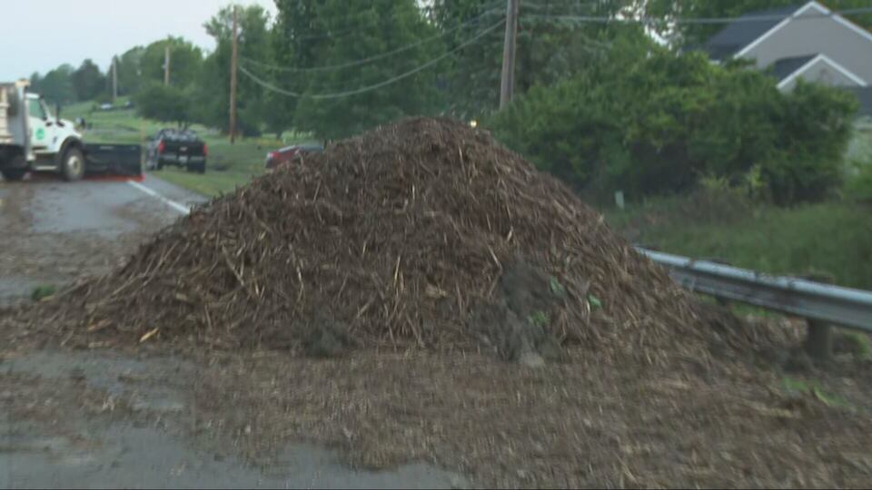 Flooding, debris closes busy road after heavy rain in Clark Co.