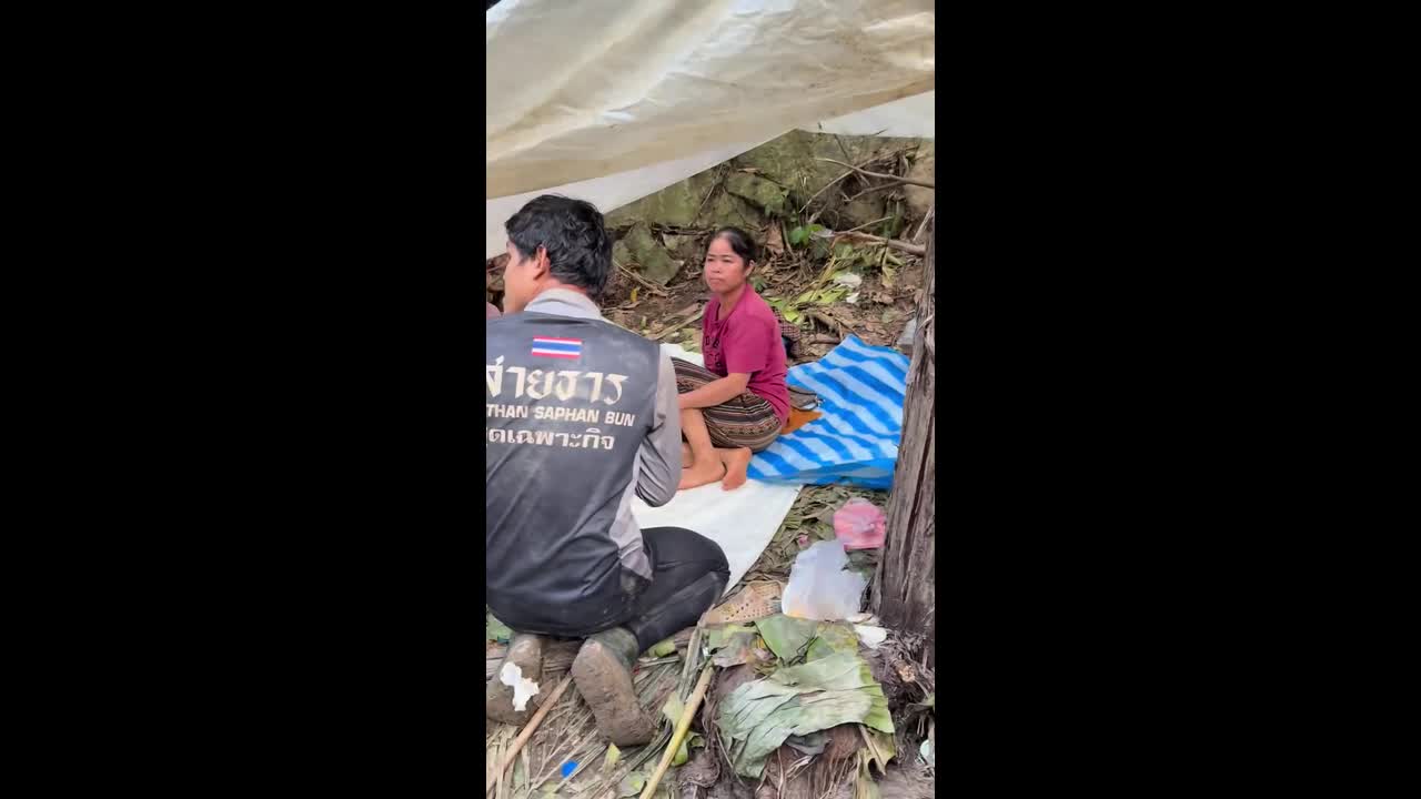 Anxious families wait for relatives as cave rescue team reaches survivors