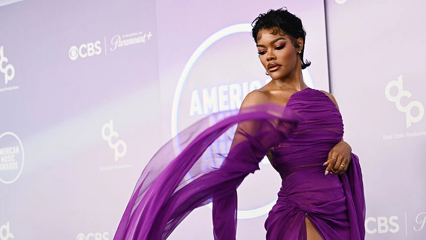 Teyana Taylor debuts edgy mullet and Balenciaga gown at AMAs