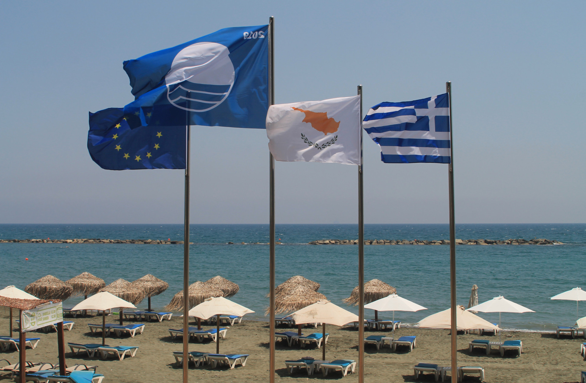 What does it take for a beach to achieve the Blue Flag status?