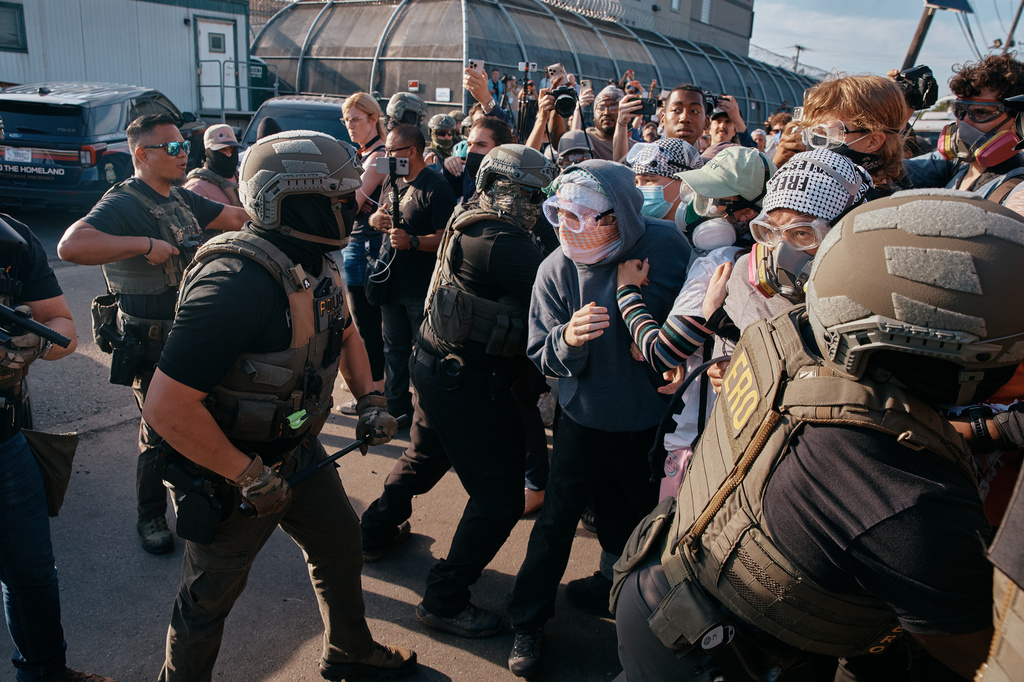 Photos show protestors and ICE agents clashing outside a New Jersey ...