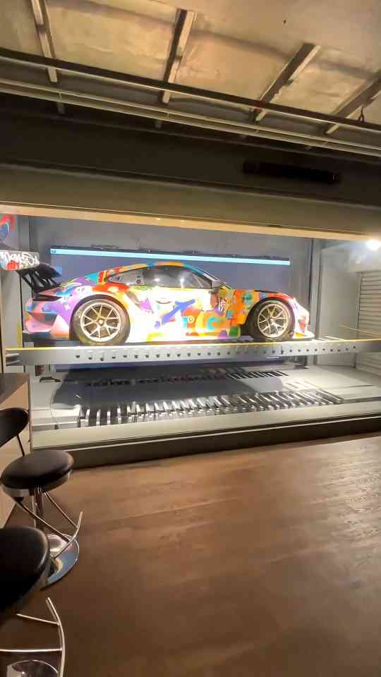 Push a button - and a supercar comes down from the sky