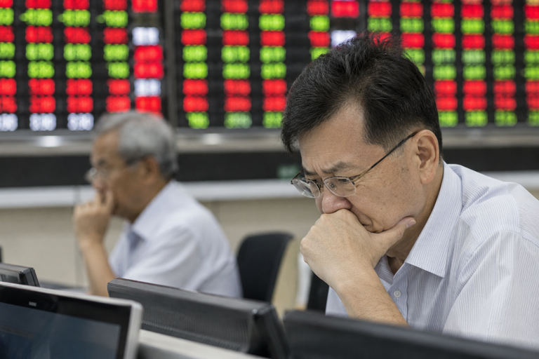 Asian markets slide as Iran tensions lift oil prices and bond yields