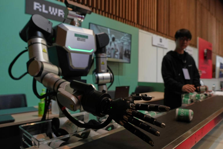 Humanoids dance and thread needles as Japanese robotics developers look ...