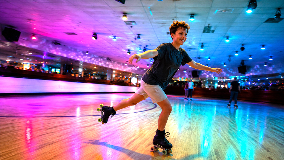 Disco skaters glide with perfect rhythm and style