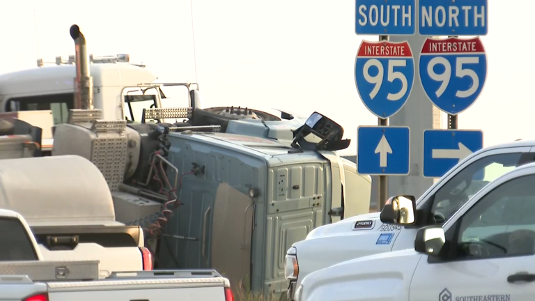 Grease truck overturns on US-421 ramp to I-95