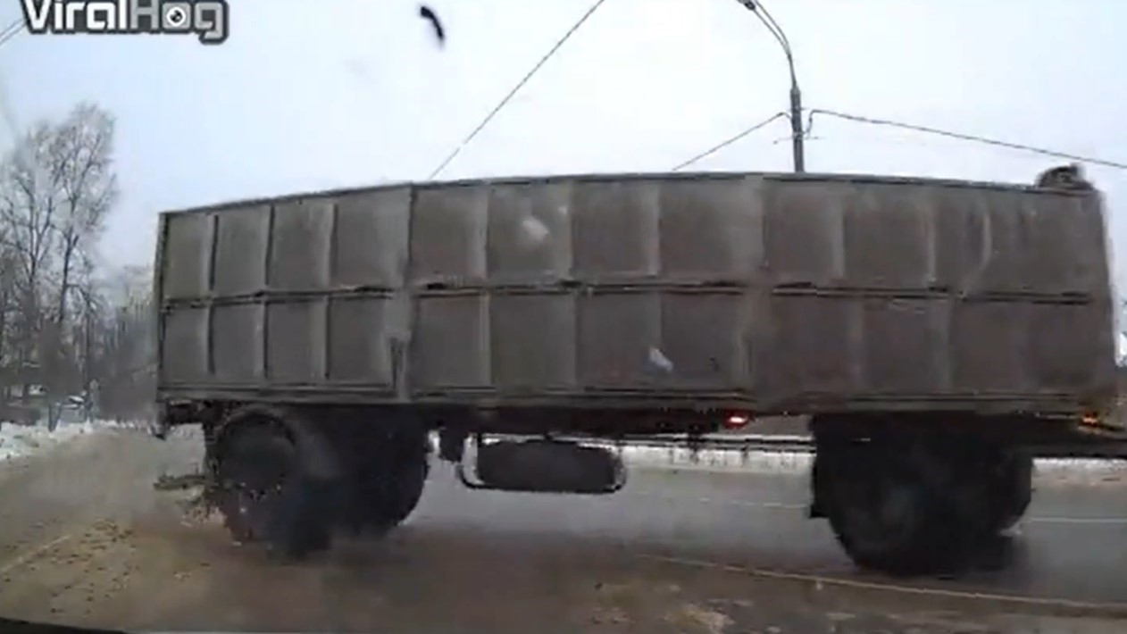 Truck trailer takes out car