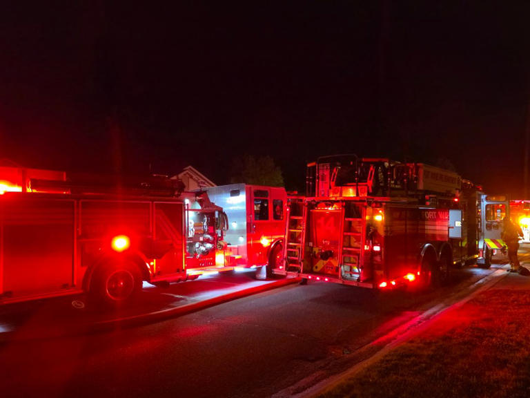 Bystander suffers minor burns after garage catches fire in Fort Wayne