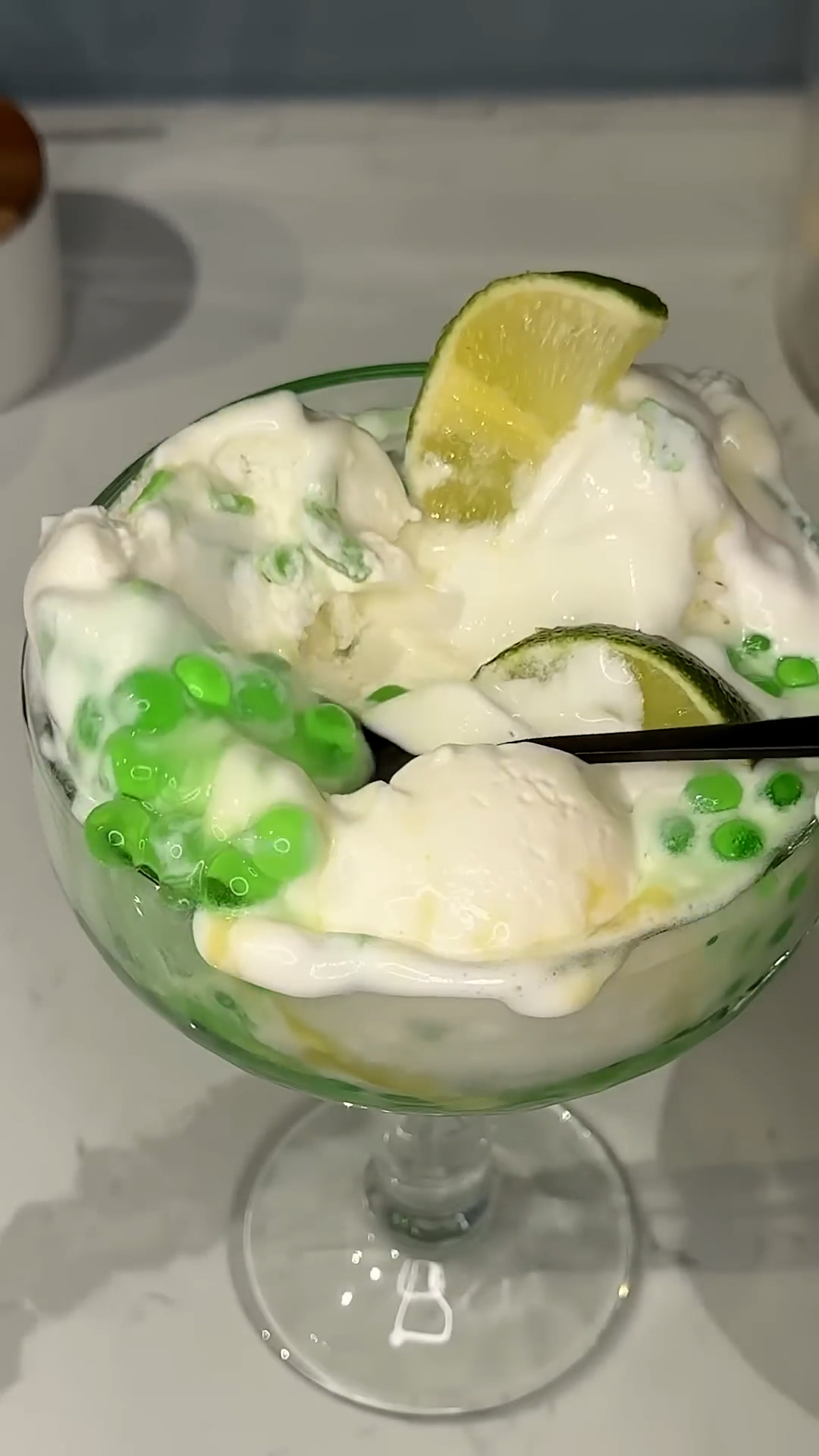 Citrus ice cream topped with tapioca pearls for cocktail-inspired dessert