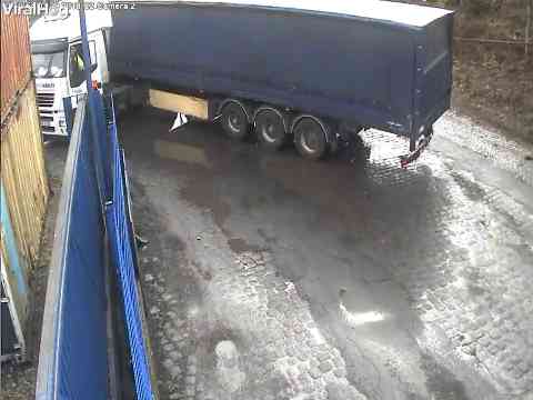 Truck driver wrecks truck attempting to make tight turn