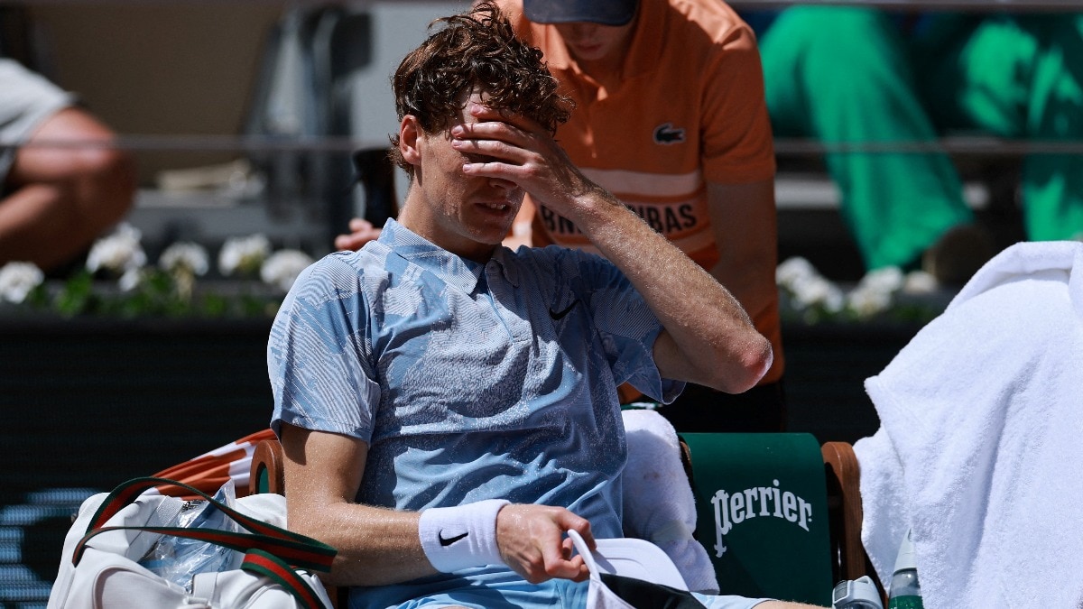 Too hot to handle? Jannik Sinner cramps and crashes out in major French ...