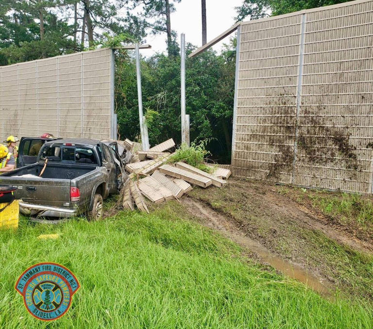 Driver hits wall, crushes truck, walks away