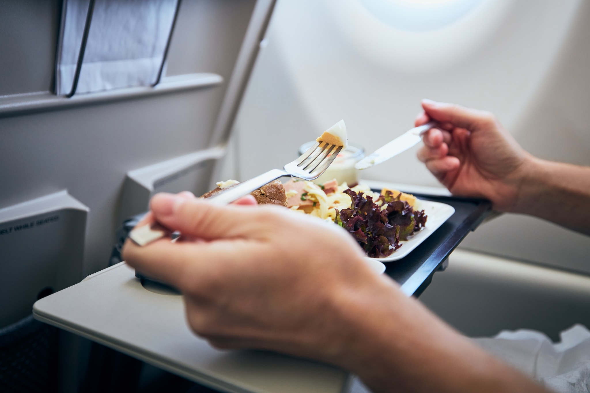 Flight attendant collects trash—not ready for ‘monstrous’ discovery