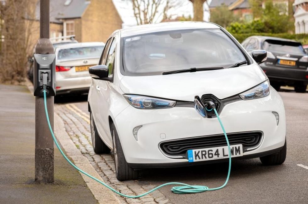 UK celebrates landmark electric car milestone as millions of drivers ...