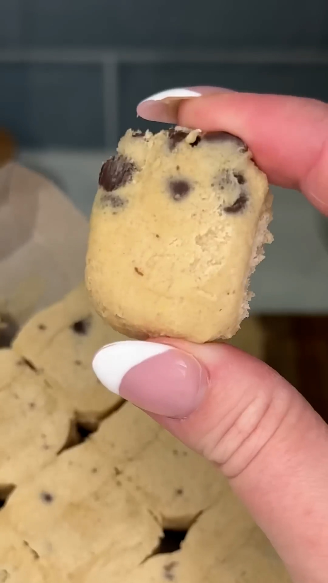 Safe dough rolled into balls and coated with melted chocolate