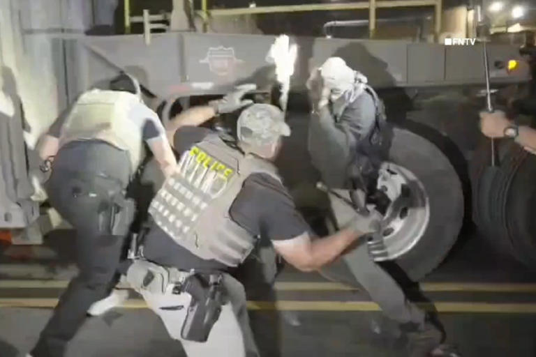 Truck driver goes off on Delaney Hall anti-ICE protesters after they ...