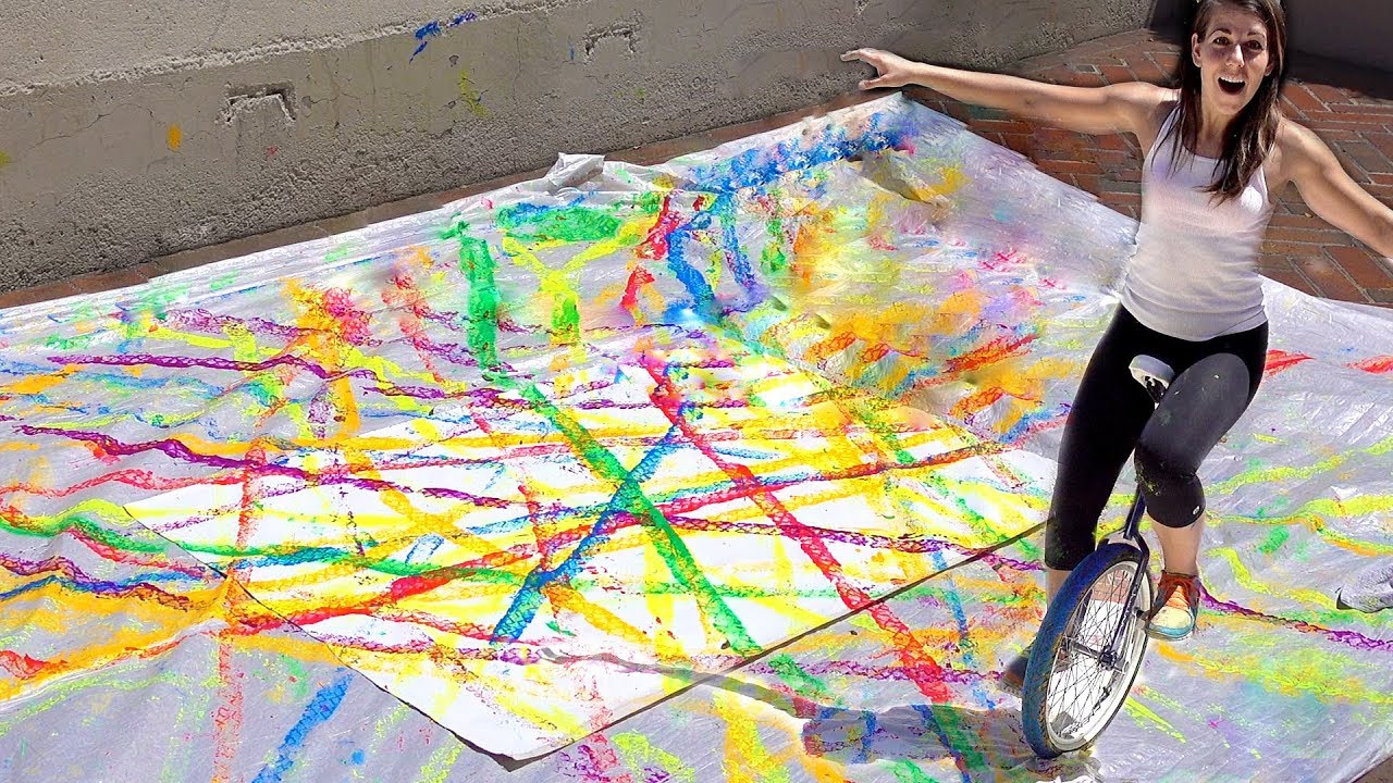 How Ali Spagnola attempted painting while riding a unicycle and juggling