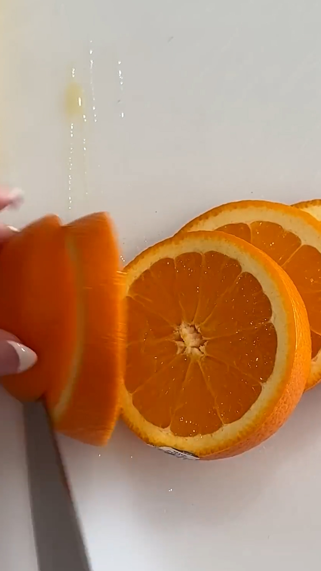 Citrus and flowers simmered on stove create home fragrance